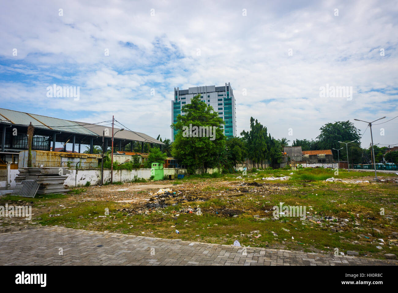 dirty empty park with trash and cloudy sky as background photo taken in ...