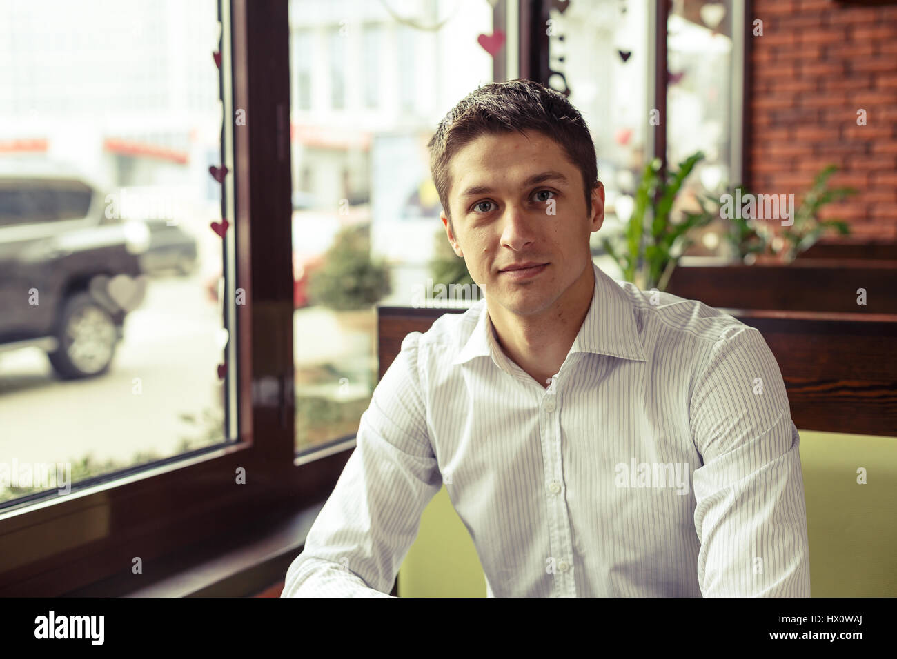 Portrait of a young businesswoman resting between work Stock Photo - Alamy