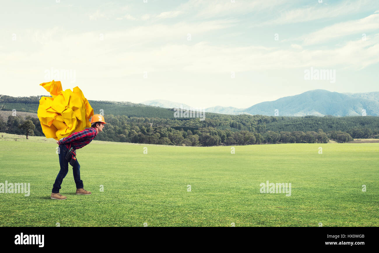 Engineer man carry load Stock Photo - Alamy
