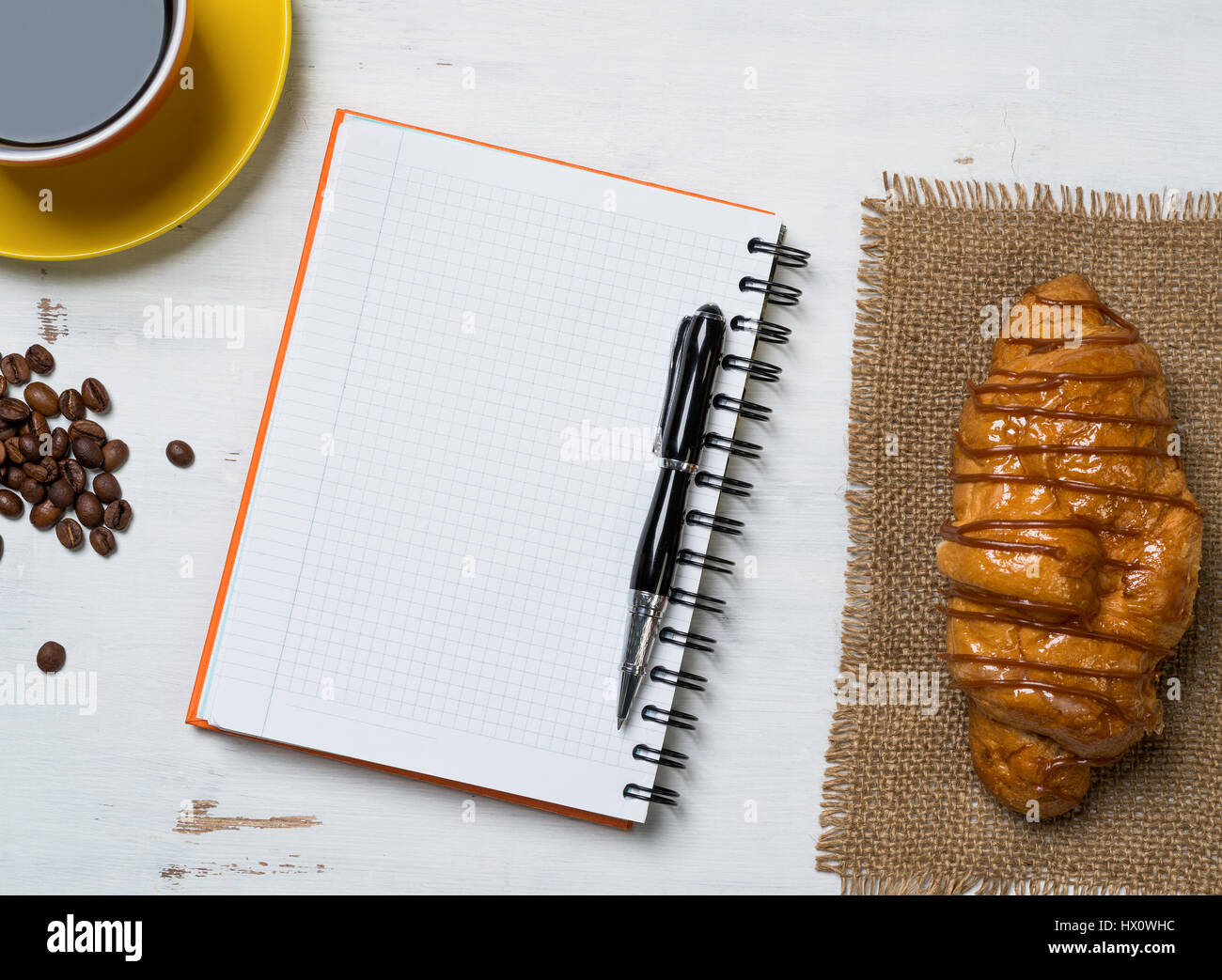 Coffee break with snack Stock Photo - Alamy