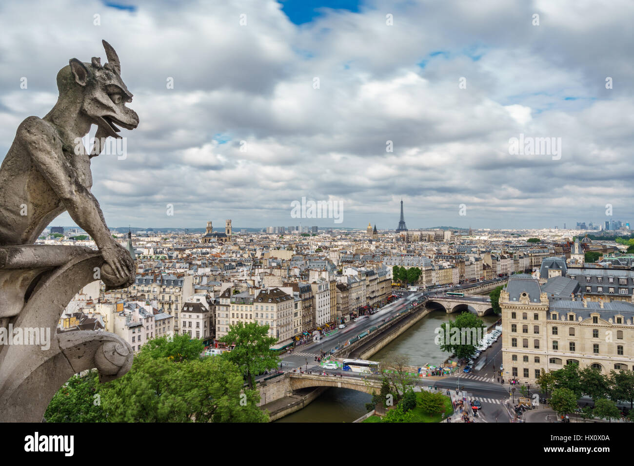 Gargoyle of Paris on Notre Dame Cathedral church and Paris cityscape ...