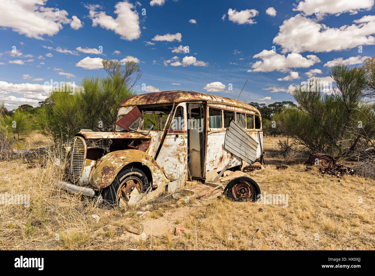 Old rusty school bus wreck in the outback, Wheatbelt, Western Australia ...