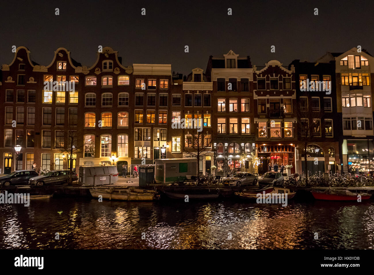 Houses in Amsterdam, traditional old flemish buildings and boats at ...