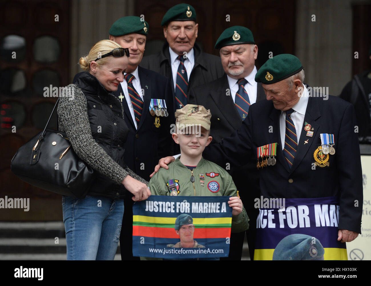 Jackson Daniel, 7, the son of a US Marine, and his mother Claire Daniel ...