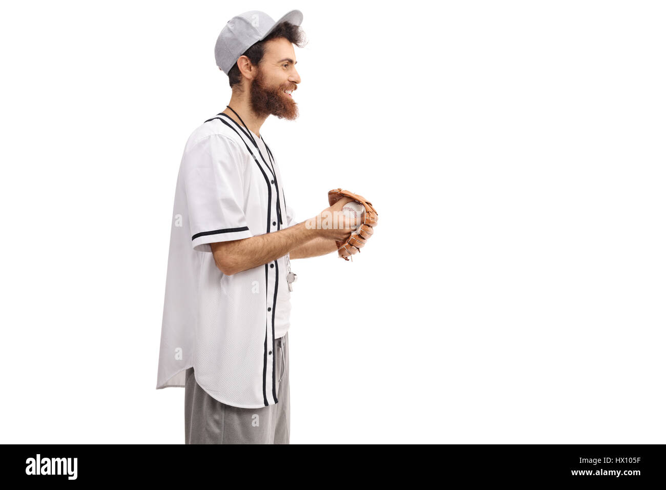 Profile shot of a baseball coach with a ball and a glove isolated on ...