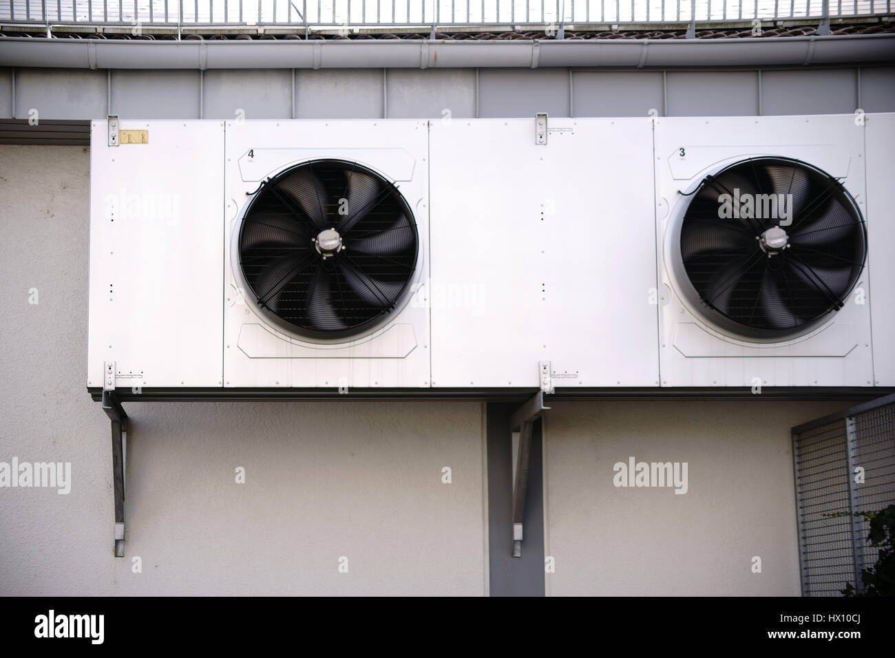 The back of large fans of an air conditioning system for the ...