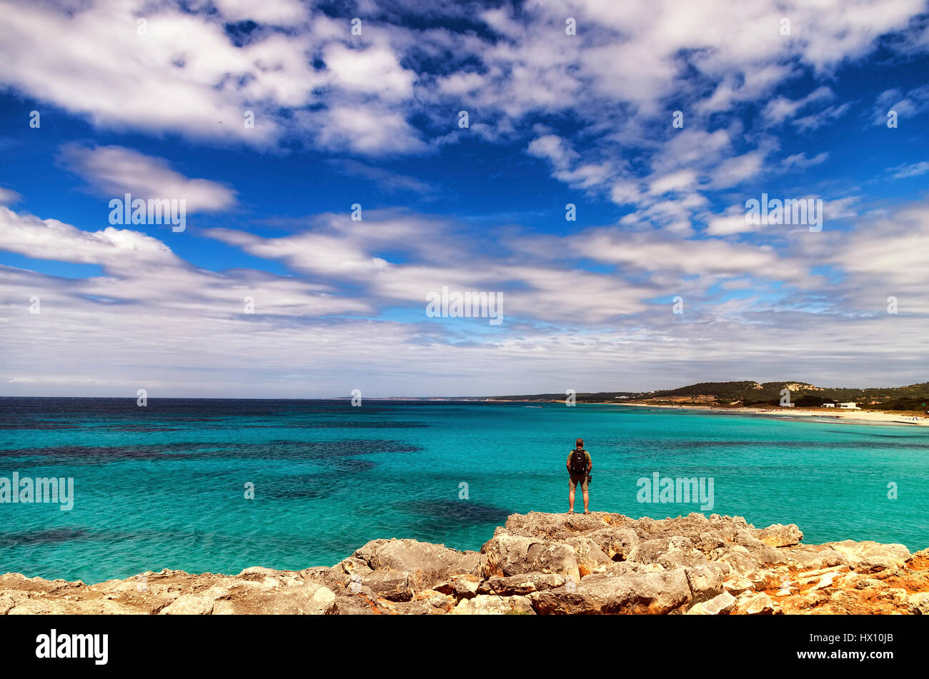 Spain, Menorca, Son Bou, man at the coast Stock Photo - Alamy
