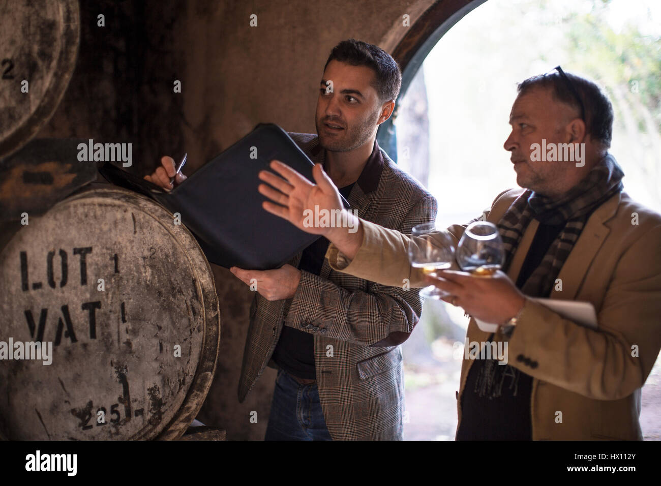 People in distillery tasing whiskey Stock Photo - Alamy