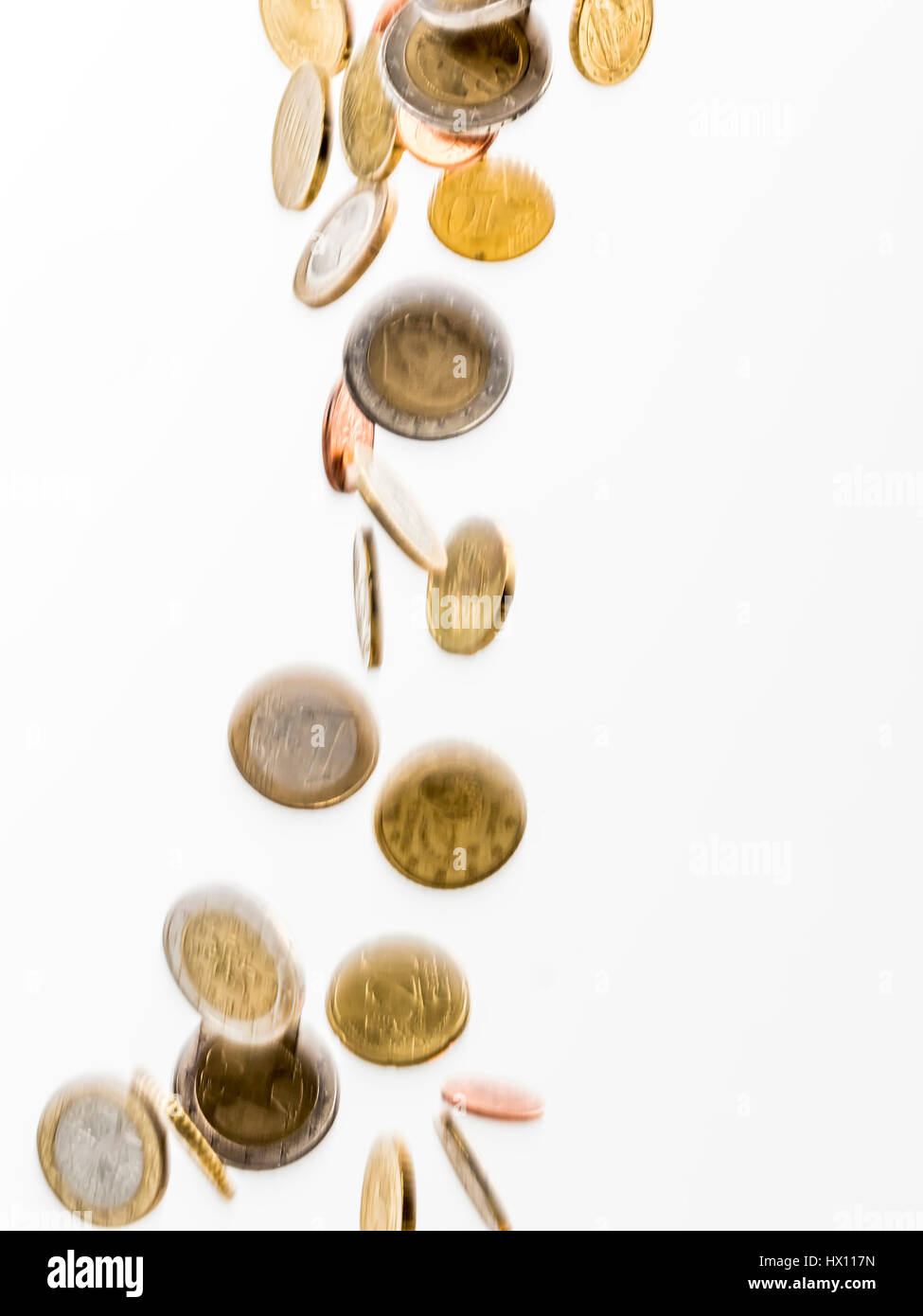 Falling Euro coins Stock Photo - Alamy