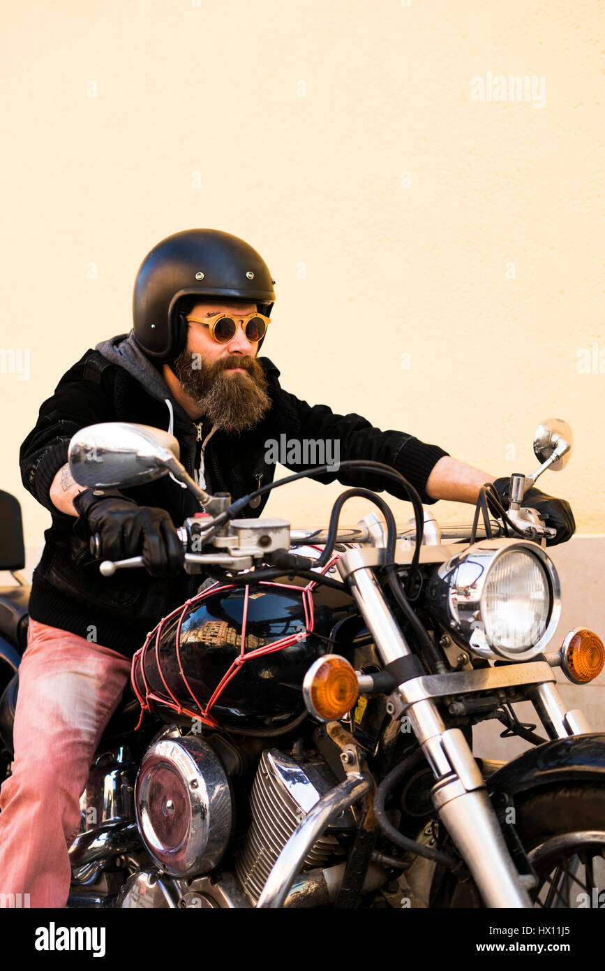 Portrait bearded biker wearing helmet hi-res stock photography and ...