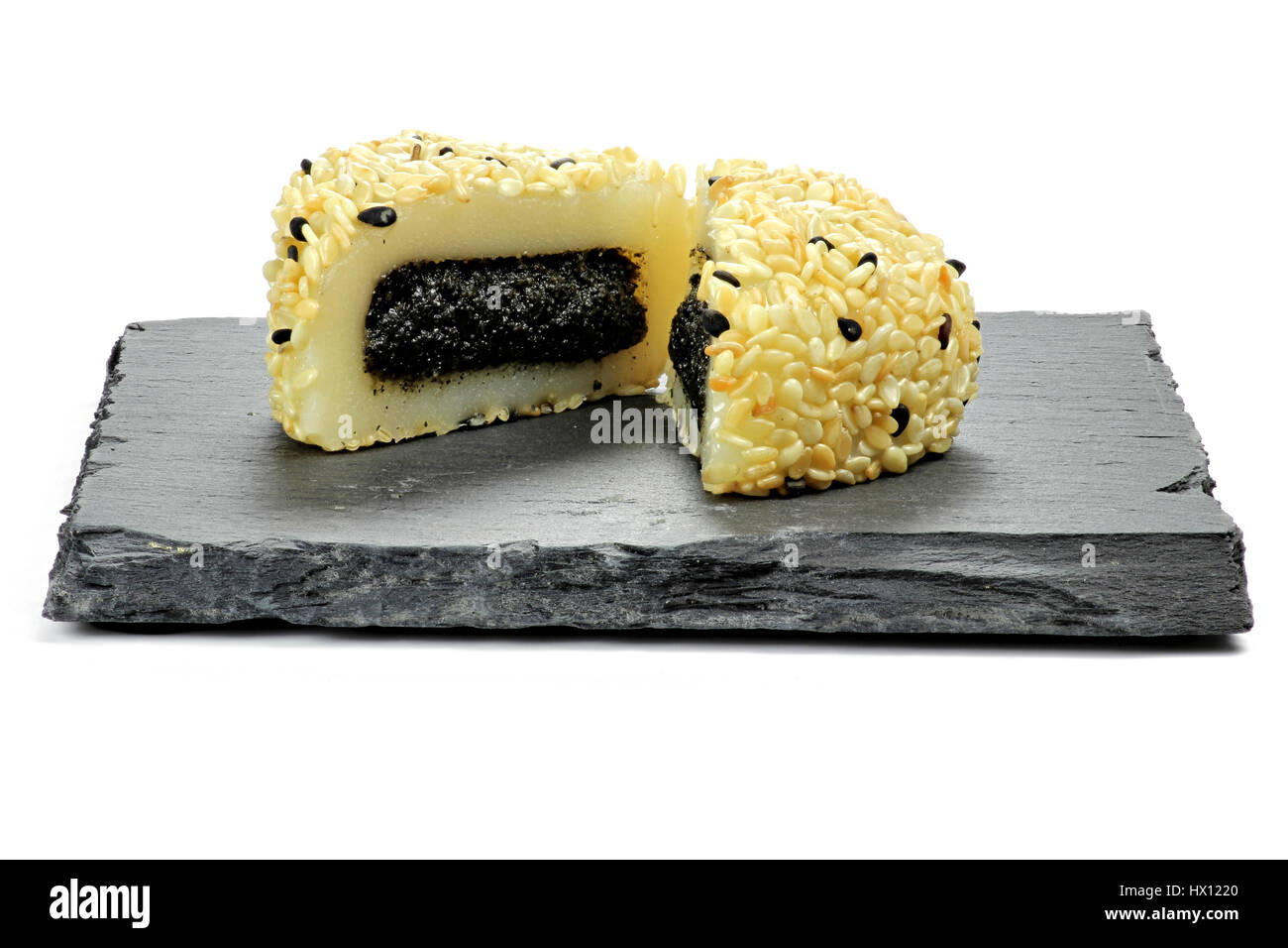 Japanese sesame mochi (rice cake) served on slate Stock Photo - Alamy