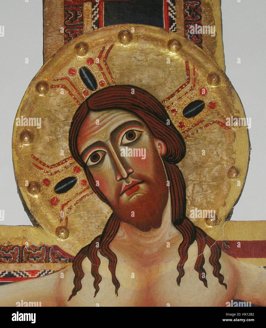 The 'Crucifix' detail refers to an intricate depiction of Christ’s ...