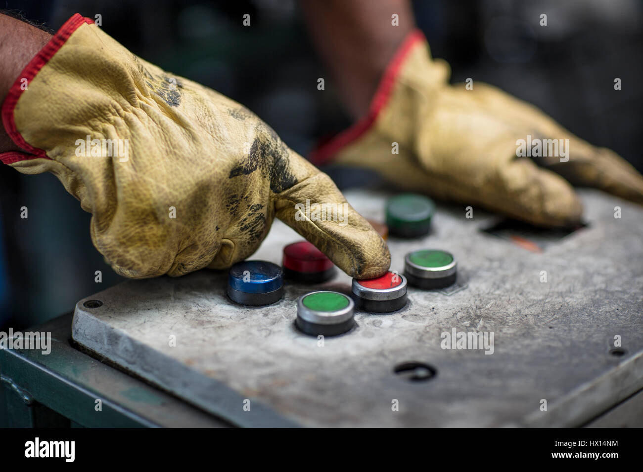 Hand operating control panel Stock Photo - Alamy
