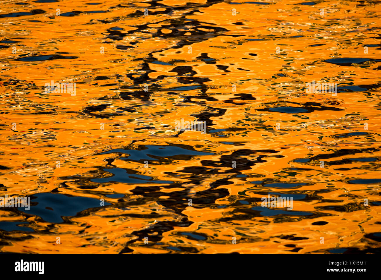 Color reflections on the sea Stock Photo - Alamy