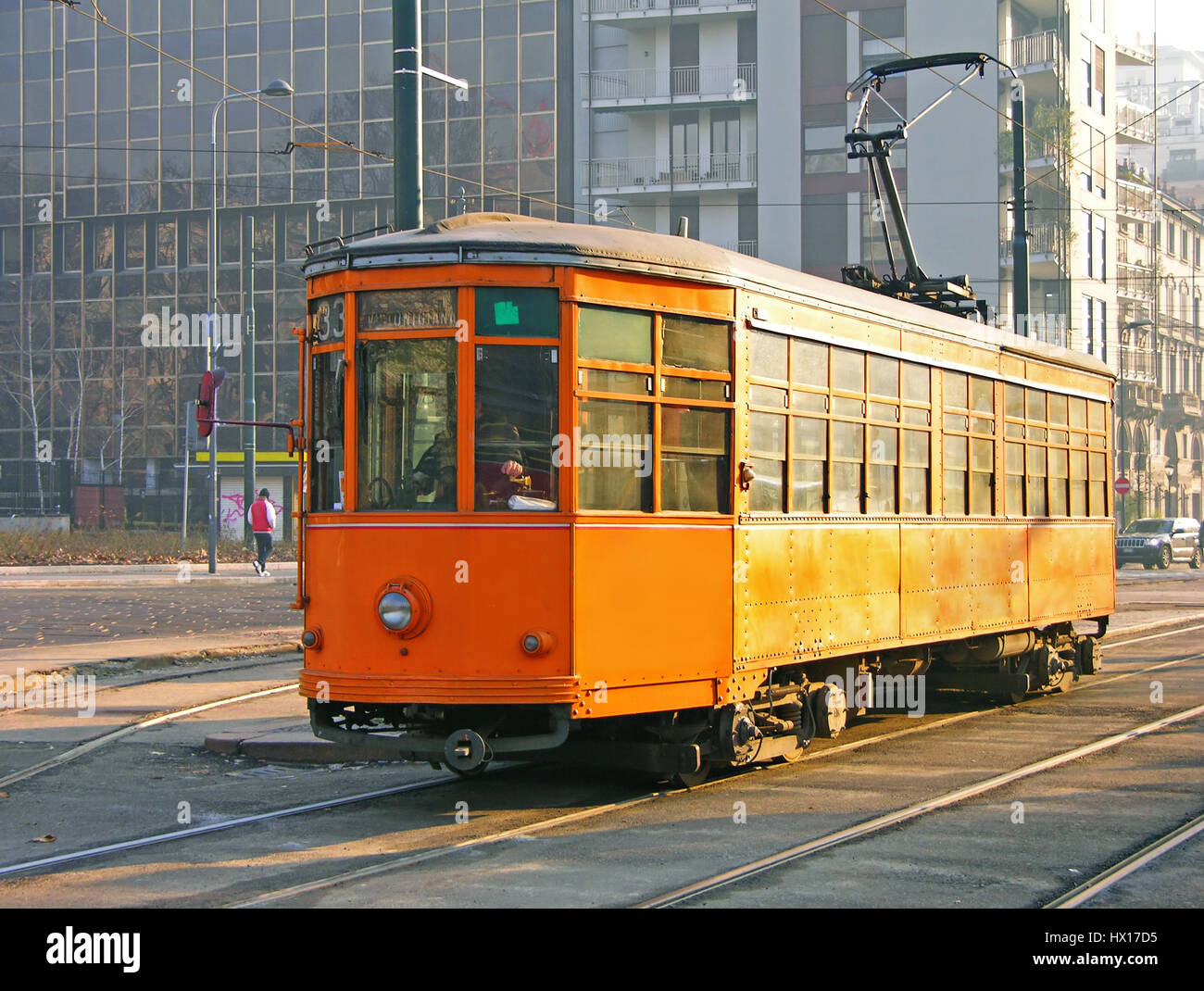Old orange trams in Milan, Italy Stock Photo - Alamy