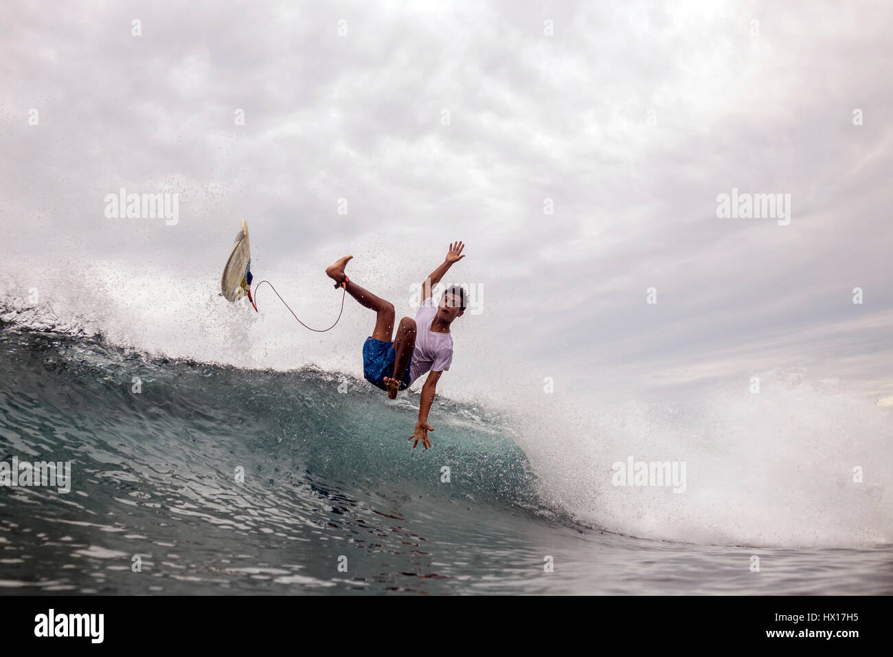 Indonesia, Java, man surfing Stock Photo - Alamy