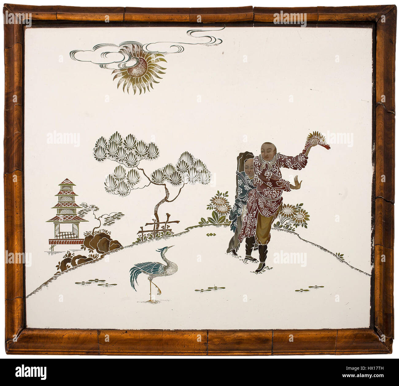 A Chinoiserie mirror features intricate designs inspired by Chinese art ...