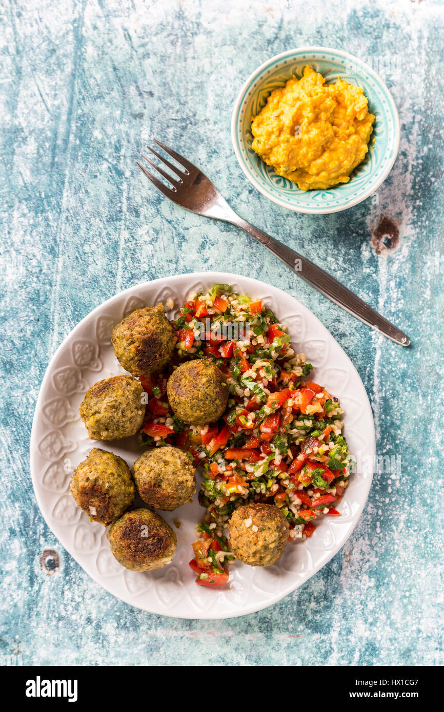 Falafel with Tabbouleh and Hummus Stock Photo - Alamy