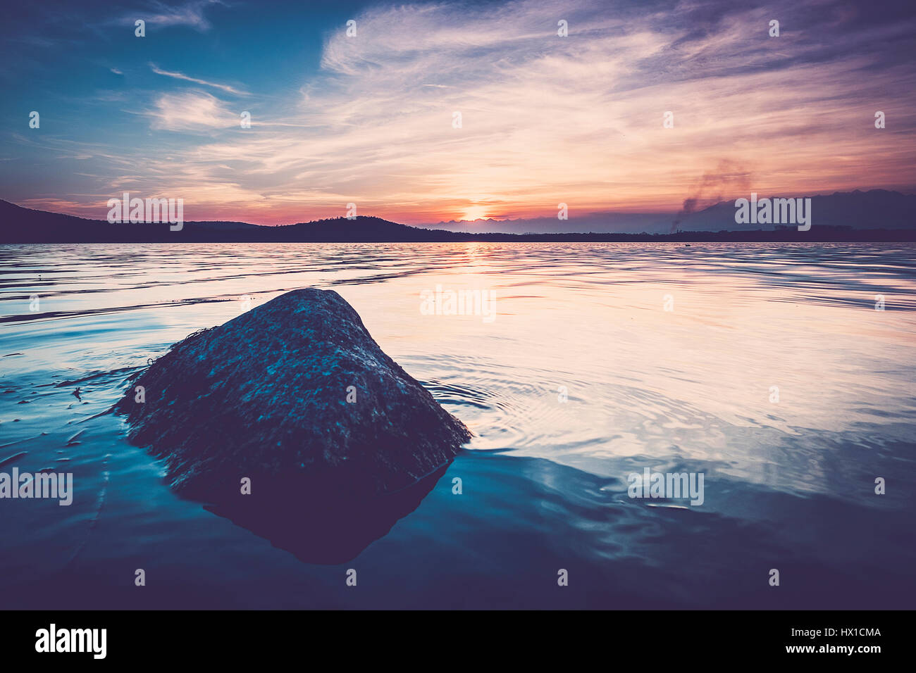 Italy, Lago Viverone at sunset Stock Photo - Alamy