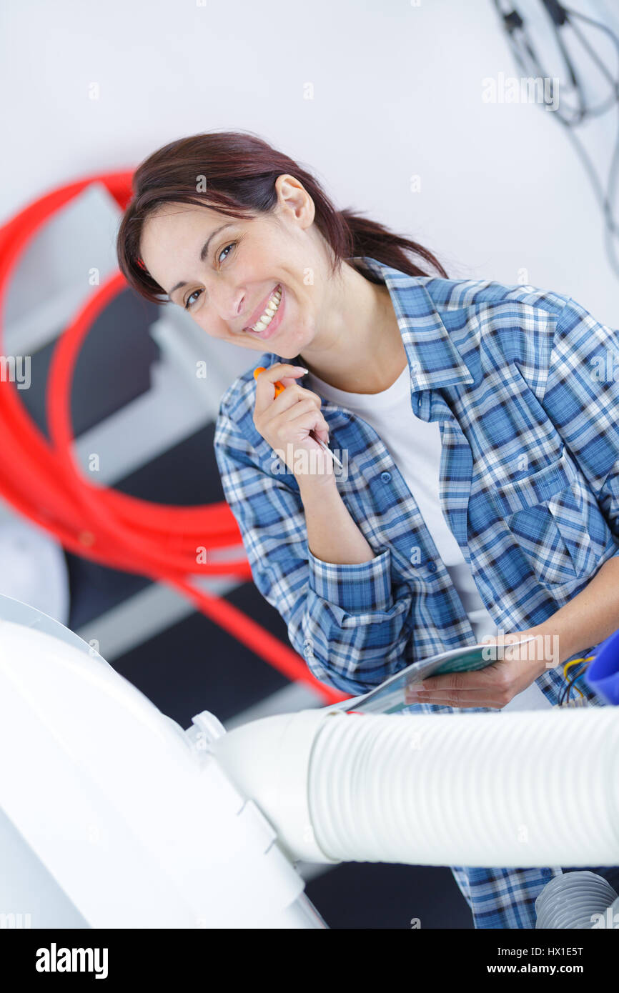 beautiful and confident young female worker Stock Photo - Alamy