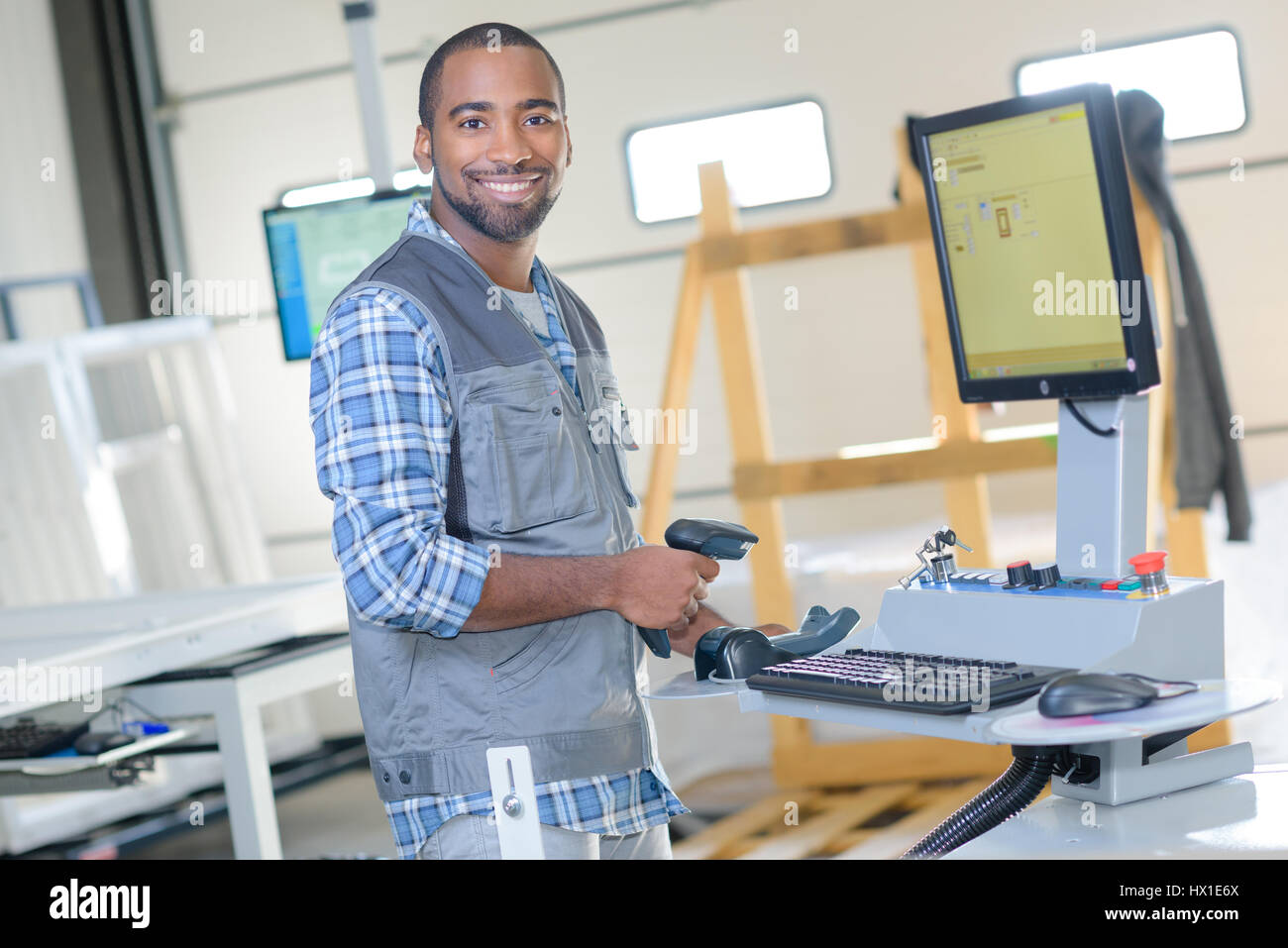 man scanning a material Stock Photo - Alamy