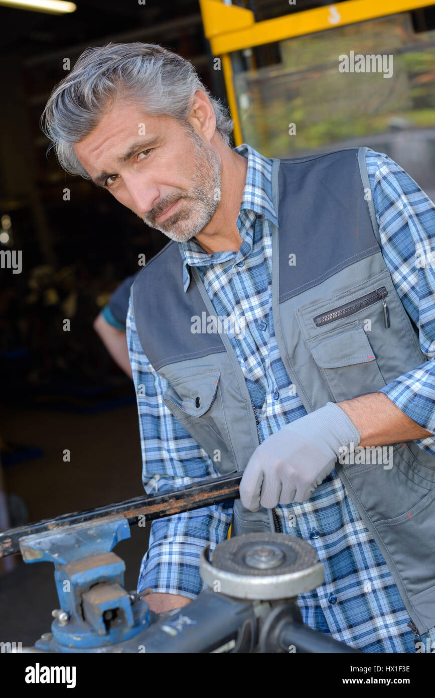 machinist fixing a machine Stock Photo - Alamy