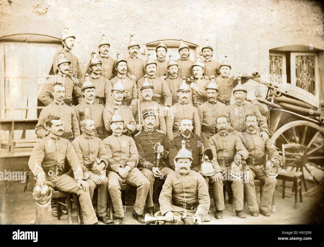A historical depiction of firemen at work, likely from the 19th or ...