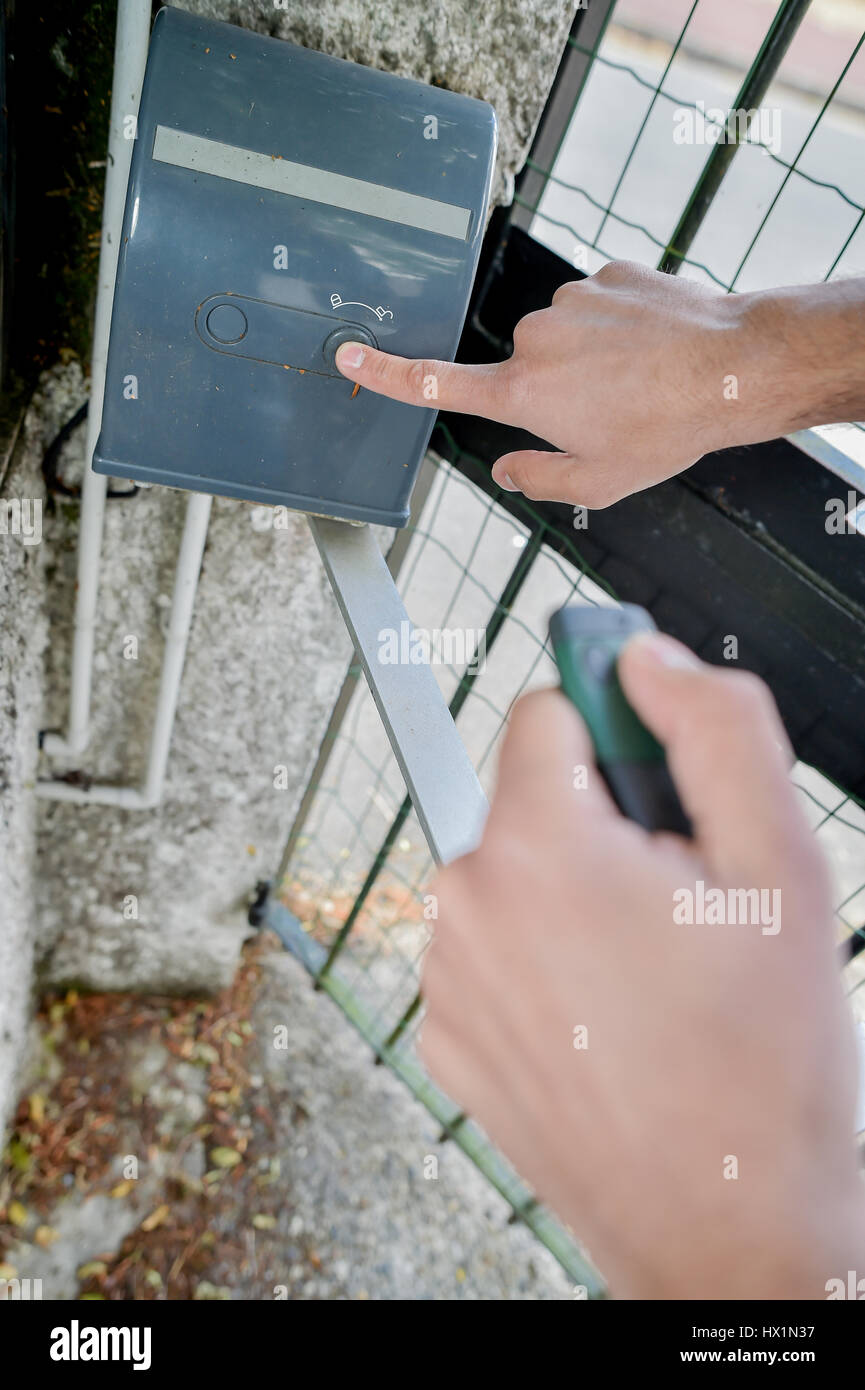 man at gate Stock Photo - Alamy
