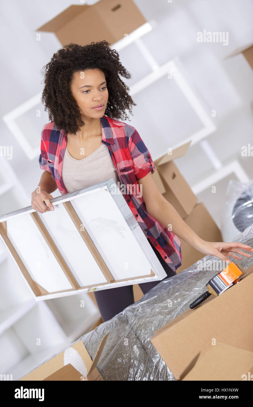 picture of attractive female with cardboard box Stock Photo - Alamy