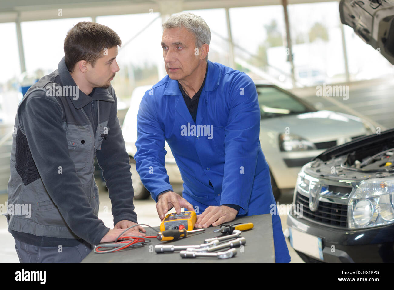 Mechanic boy working work hi-res stock photography and images - Alamy
