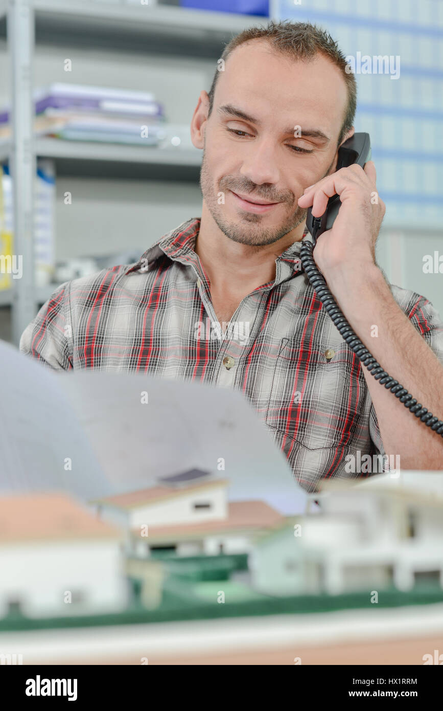contractor on telephone Stock Photo - Alamy