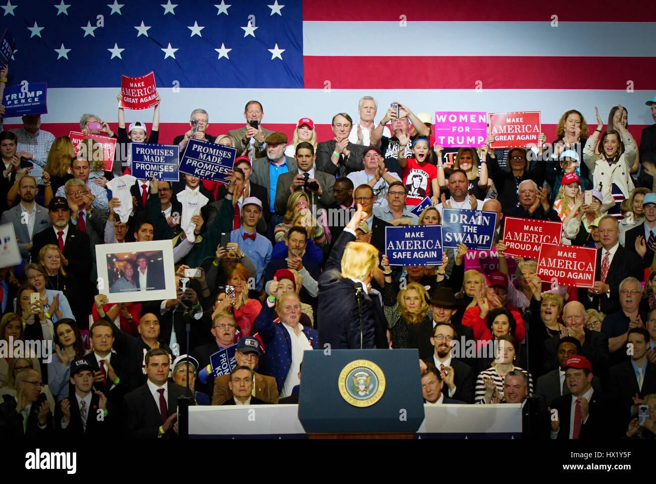 President Donald J Trump giving a thumbs up to a crowd of supporters ...