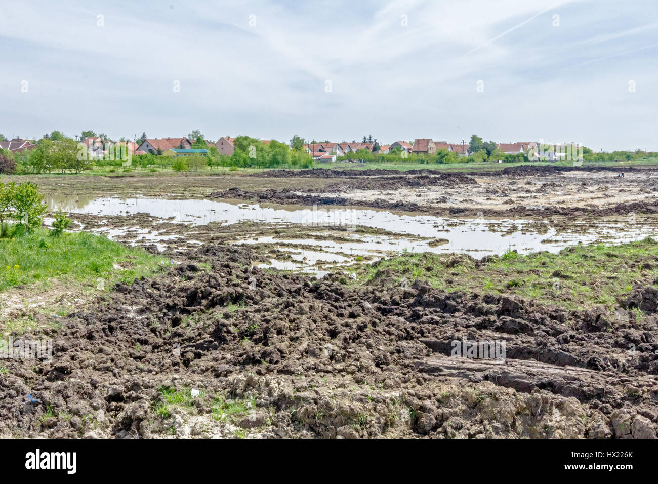 Landscape transform into urban area with machinery, people are working ...