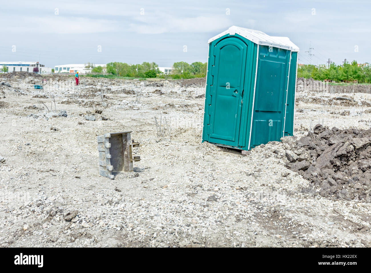 Two transportable public street toilets are placed at building site ...