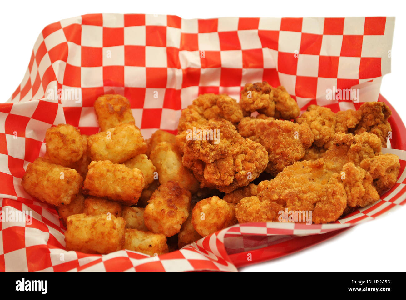 Deep Fried Chicken Nuggets with Tator Tots Stock Photo - Alamy