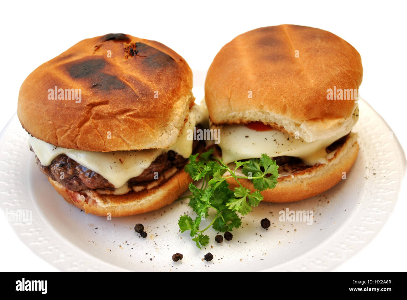 Two Juicy Cheese Burgers Stock Photo - Alamy
