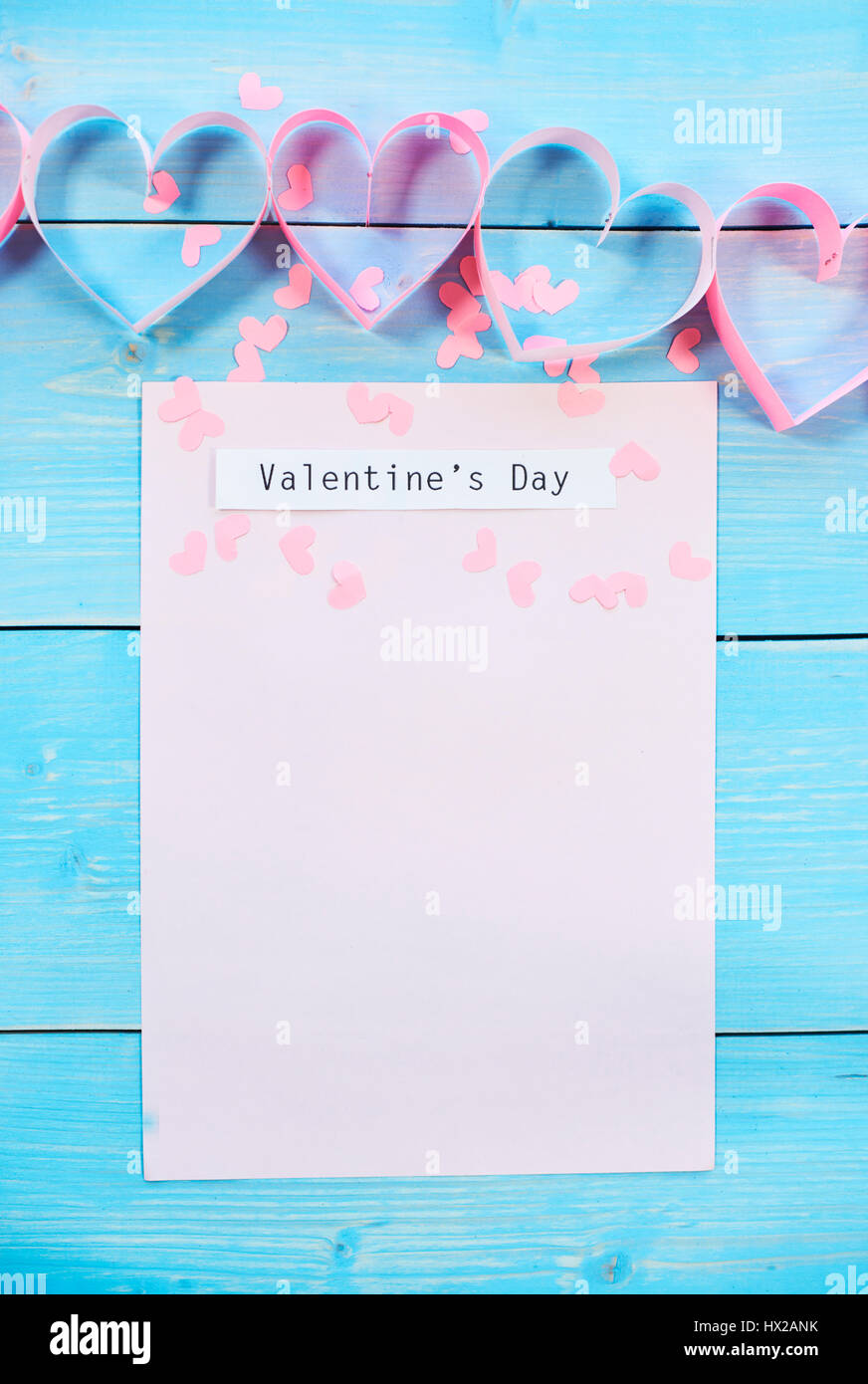 Love message with paper hearts Stock Photo - Alamy