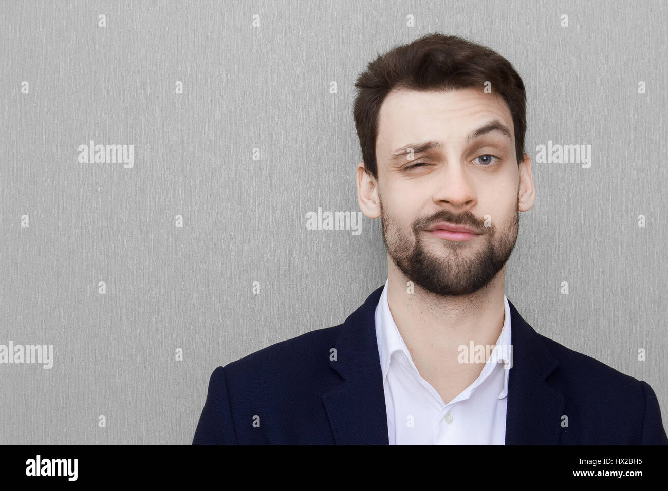 Handsome guy in a suit hi-res stock photography and images - Alamy