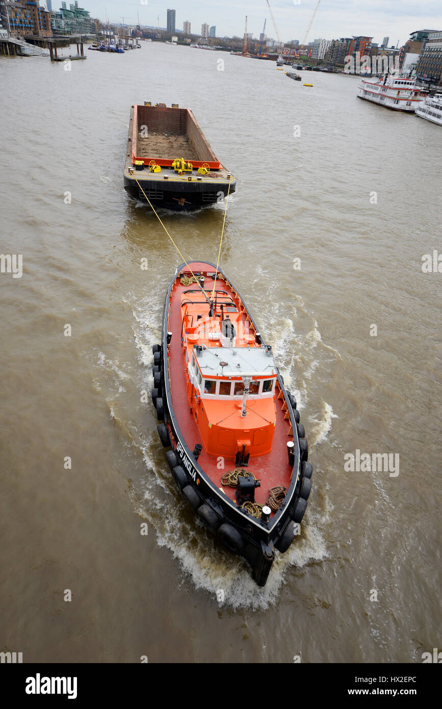 Cory Environmental waste barge being pulled by a tug along the River ...