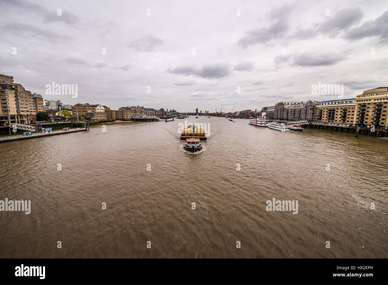 Cory Environmental waste barge being pulled by a tug along the River ...