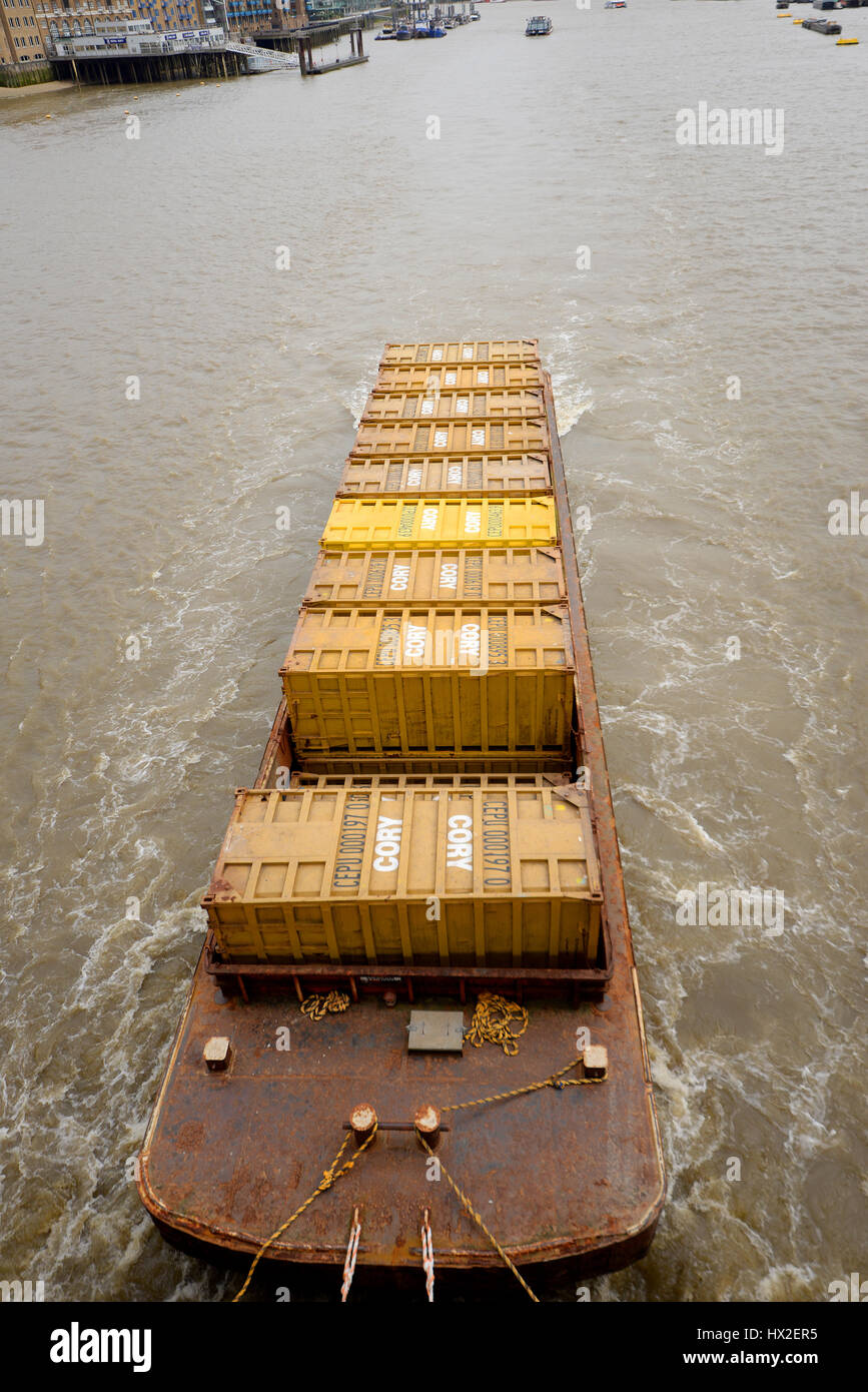 Cory Environmental waste barge being pulled by a tug along the River ...