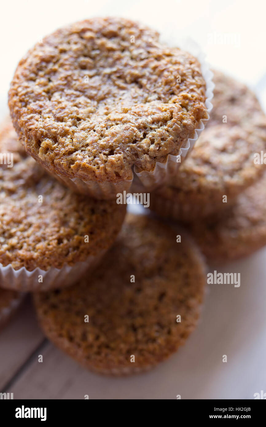 Bran muffins stacked stacked on top of each other Stock Photo - Alamy