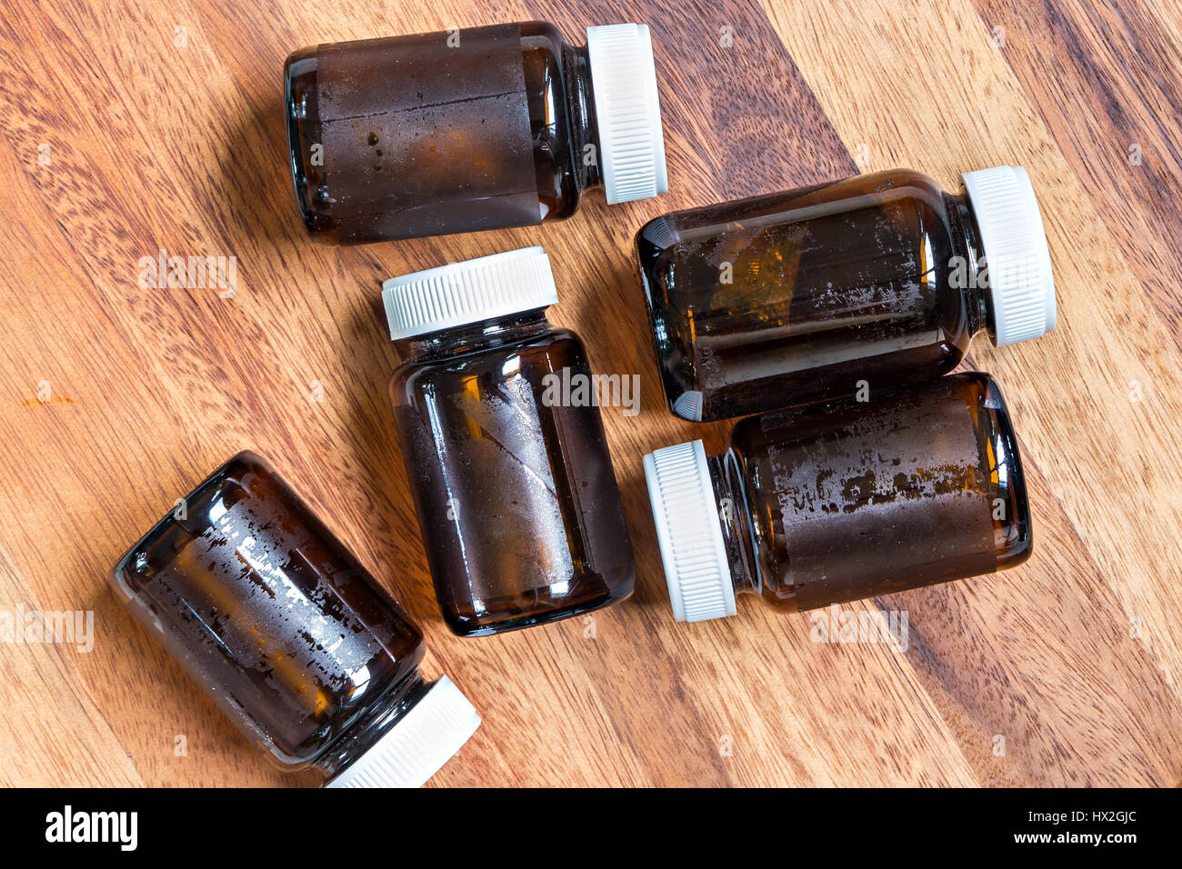 Used glass bottles for recycle Stock Photo - Alamy