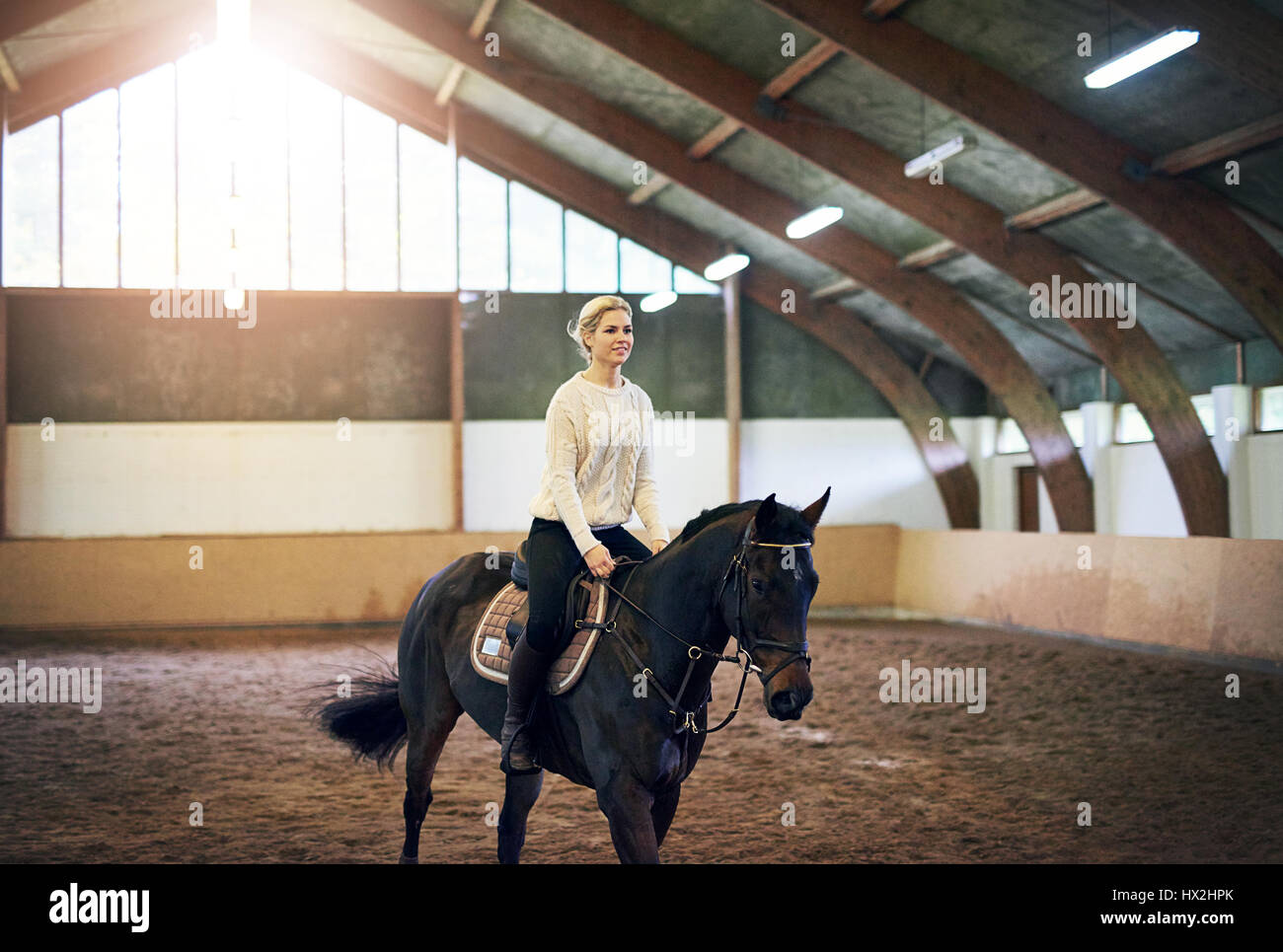 Female horse riding indoor hi-res stock photography and images - Alamy