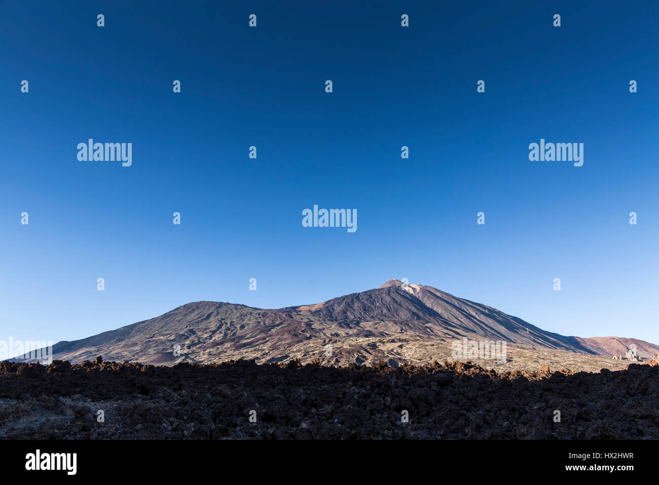 Mount Teide volcano beneath a deep blue sky in the Las Canadas del ...