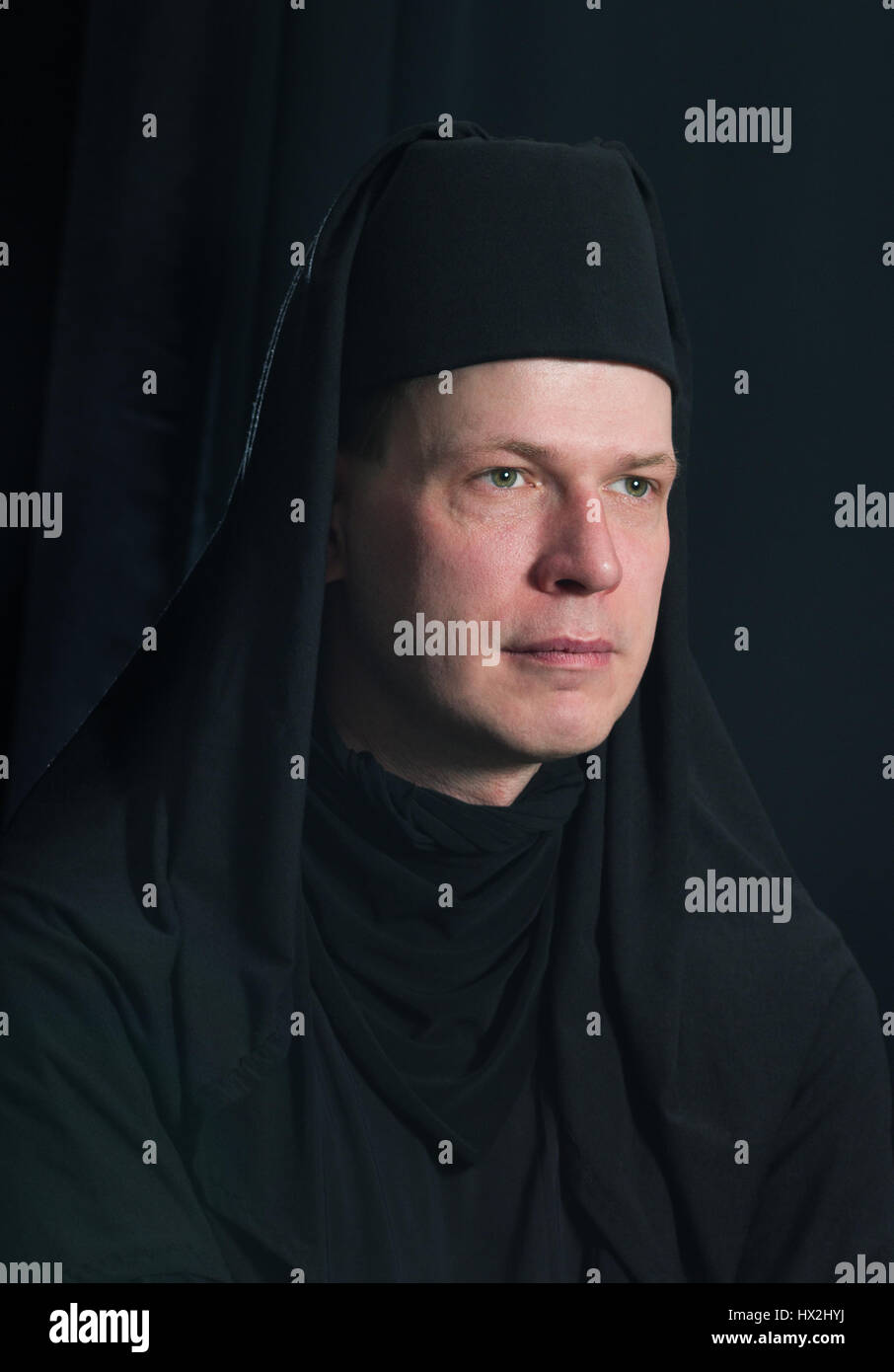 Man black robe cape hi-res stock photography and images - Alamy