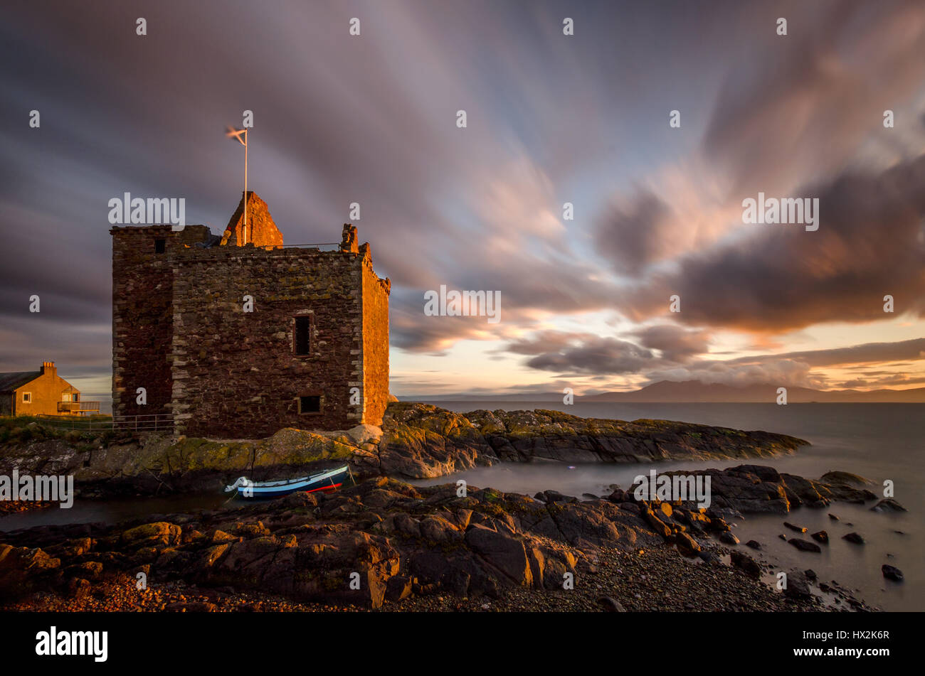 Portencross, Scottish castle on coastline in susnset light Stock Photo ...