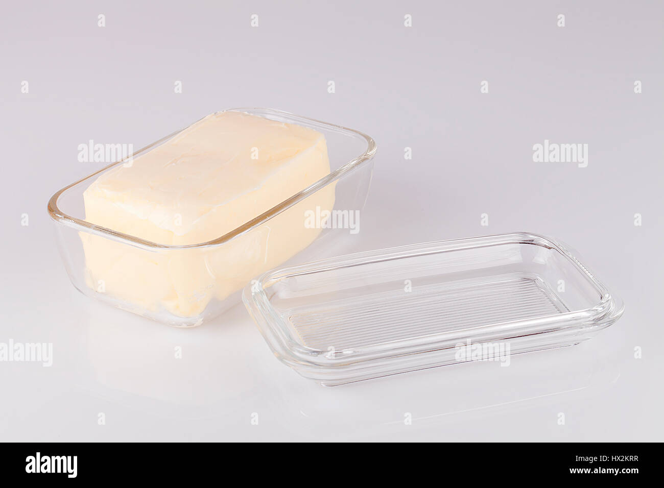 Butter in a glass container isolated on a white background Stock Photo ...
