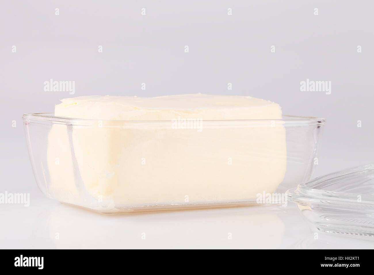 Butter in a glass container isolated on a white background Stock Photo ...