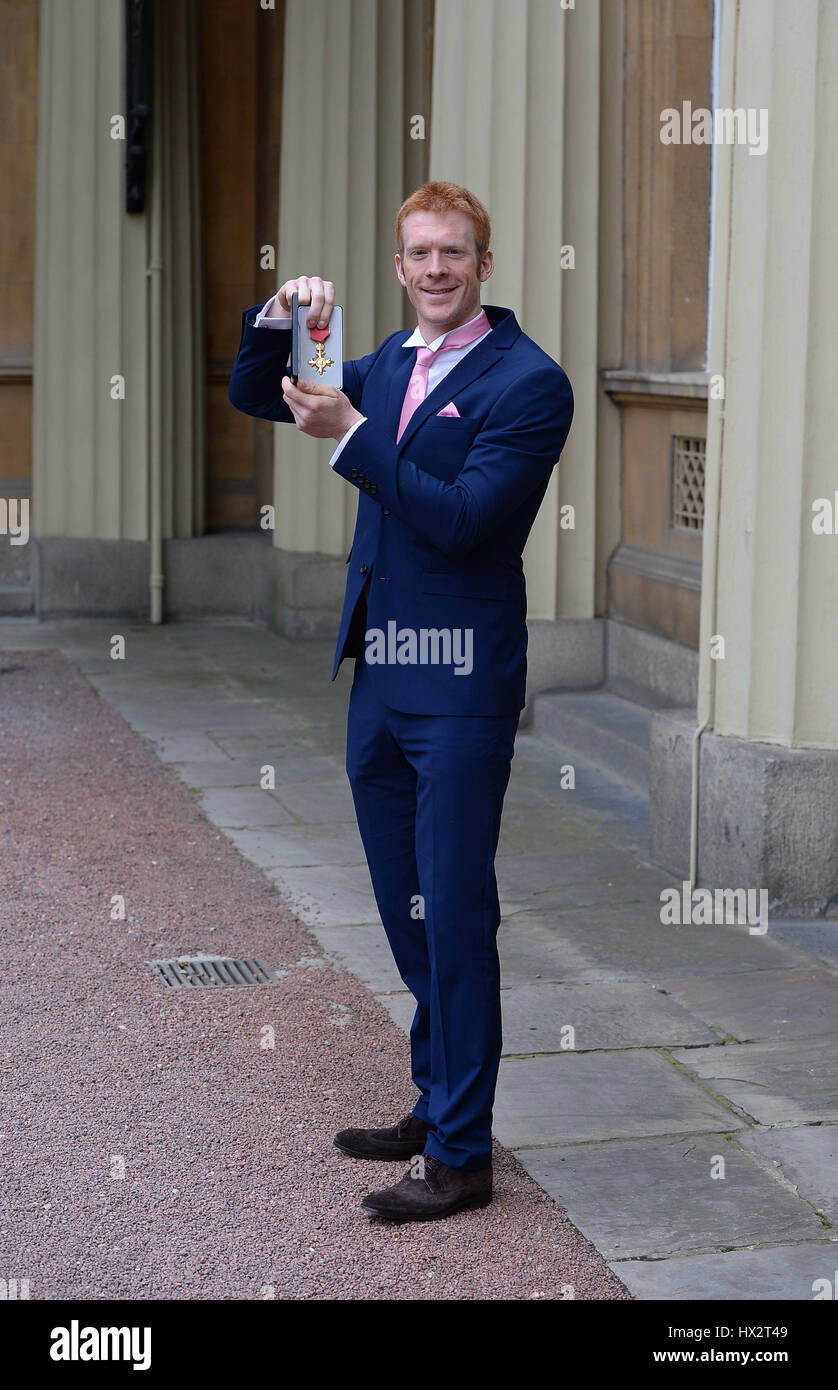 Cyclist Ed Clancy with his OBE after receiving it from the Prince of ...